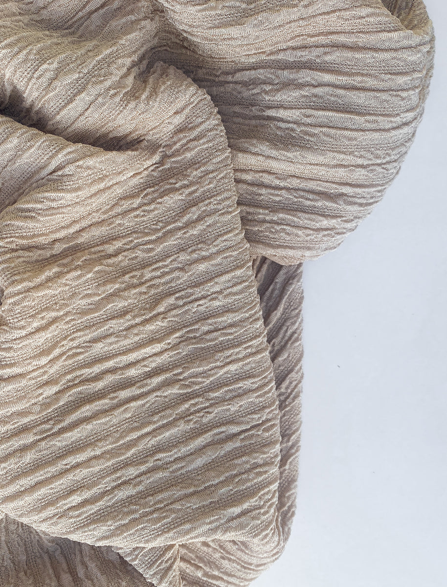 Pleated, Textured Knitted Fabric