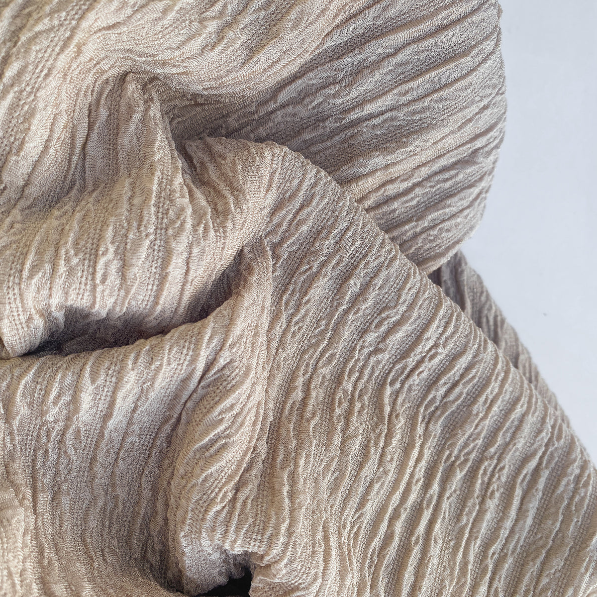 Pleated, Textured Knitted Fabric